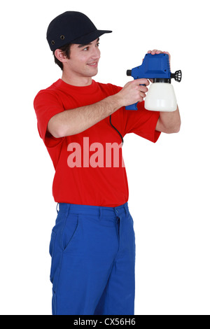 junior plumber against white background Stock Photo - Alamy