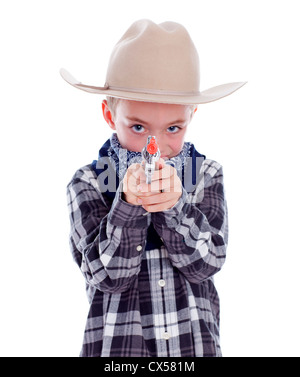 handsome Western cowboy with gun and badge sitting in studio Stock ...