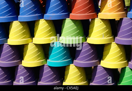 Different color Clay Pots Arranged one above one for Flower Pot Sales ...