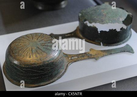 Late Roman Iron Age (c. 160-375 A.C.). Bronze strainer and ladle. From ...