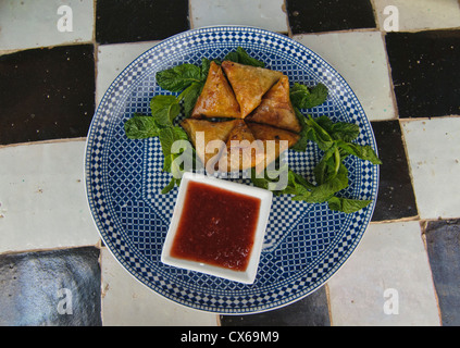 pastilla, Moroccan spring rolls, in Marrakech, Morocco Stock Photo - Alamy