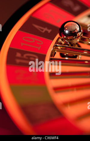 A stationary roulette wheel with the ball on number 33 Stock Photo - Alamy