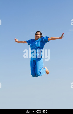 happy nurse jumping Stock Photo - Alamy
