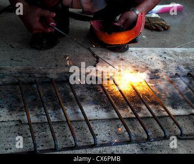 Construction worker welding without a protection mask Stock Photo - Alamy