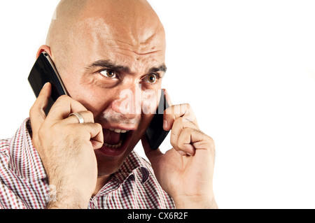 Frustrated young businessman using cell phone near broken down car at ...