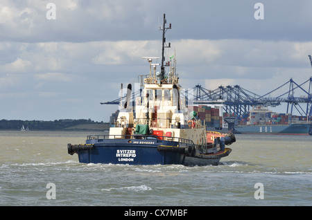 Svitzer intrepid tug boat sailing away Stock Photo - Alamy