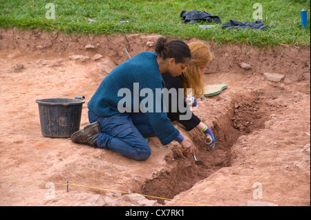Archaeology students working at an excavation site of the ancient greek ...
