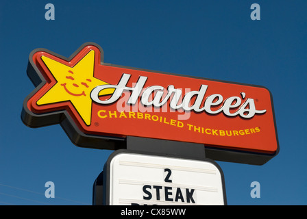 A Hardee's fast food restaurant sign in Surf City , Topsail , North ...