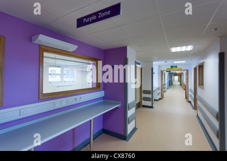 Empty UK NHS hospital corridor view, showing patients walking blurred ...