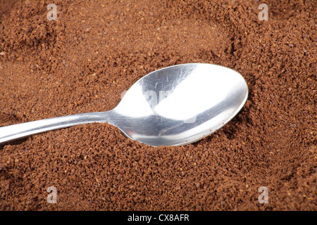 milled coffee and one teaspoon Stock Photo - Alamy
