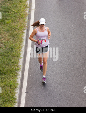 female marathon runner front view Stock Photo - Alamy