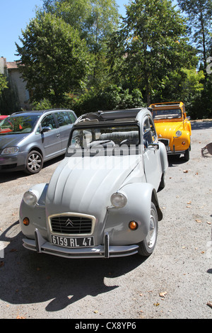 Old yellow Citroën 2CV with open roll-back canvas sunroof in Helsinki ...