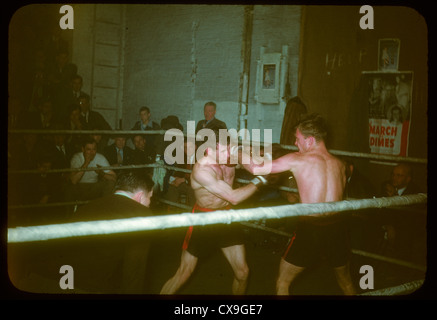 boxing match 1950 sports boxers landing blow punch color kodachrome ...
