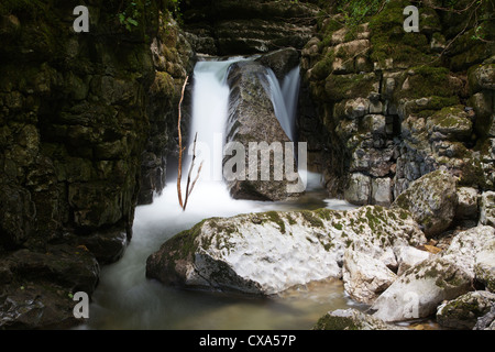 Waterfall in limestone gully at The Howk, Caldbeck, Lake District ...