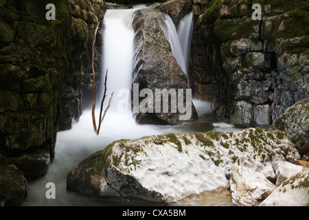Waterfall in limestone gully at The Howk, Caldbeck, Lake District ...
