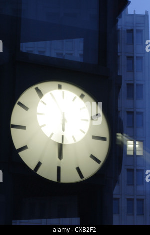 Radiant Clock and office building Stock Photo - Alamy