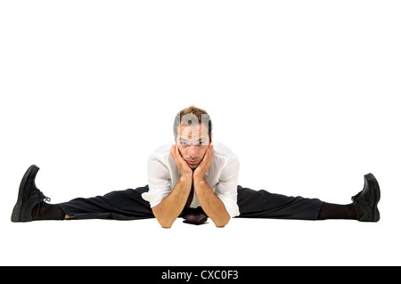 Businessman doing splits on the floor Stock Photo - Alamy