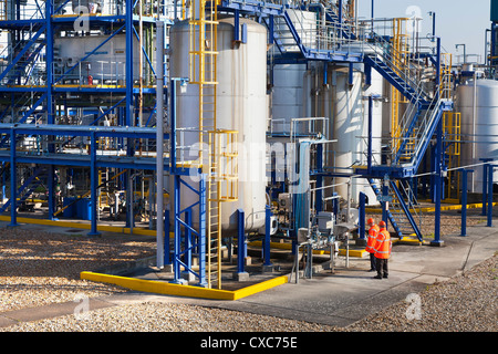 chemical plant process operator petro-chemical industry checking tower ...