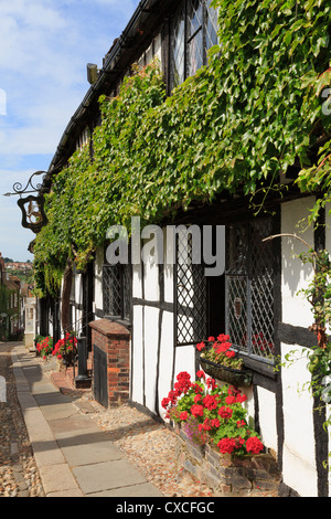 15th century haunted timbered Mermaid Inn on quaint cobbled street in ...
