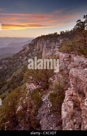 Vast Grand Canyon landscape with rugged terrain and clear blue sky. USA ...