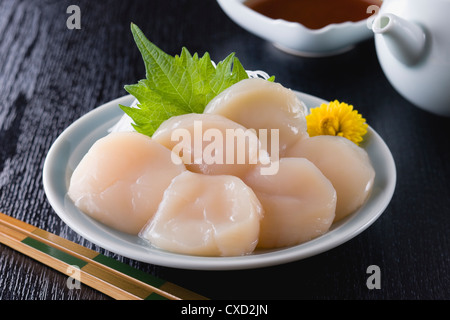 Japanese cuisine Sashimi with raw scallop Stock Photo - Alamy