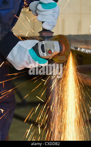 Yellow hot sparks at grinding steel material Stock Photo - Alamy