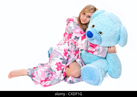 Teen girl with teddy bear, isolated on white background Stock Photo - Alamy