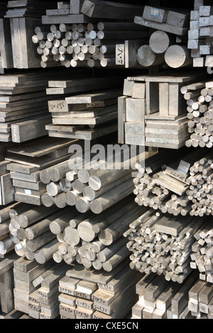 Steel profile on shelves. Metal storage details. Warehouse in shop ...