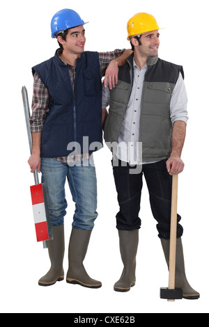Two friendly male builders Stock Photo - Alamy