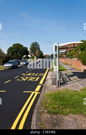 Newly painted lines on a freshly tarmacked road Stock Photo - Alamy