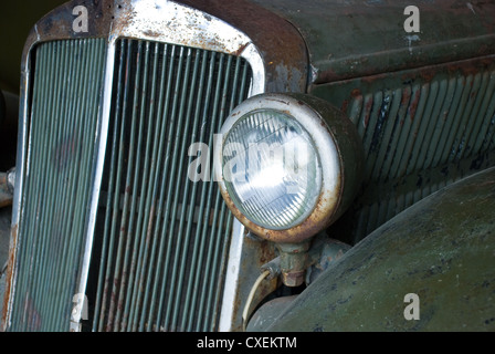 Vintage old broken car painted Ndebele geometric mixed vivid colors of ...