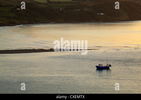 Lobster potter waiting for high tide to return to port on the Teifi ...