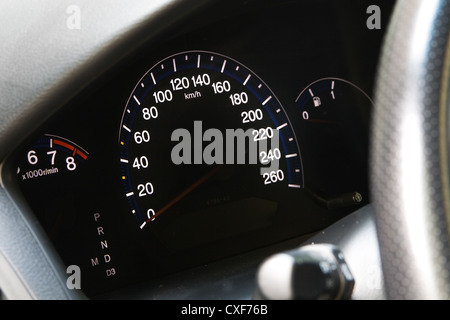 Modern car illuminated dashboard closeup, tachometer Stock Photo - Alamy