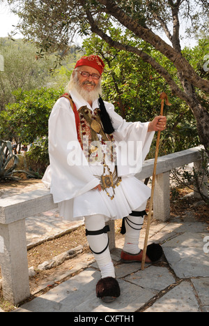A man in costume of an ancient Greek warrior in the streets of Athens ...