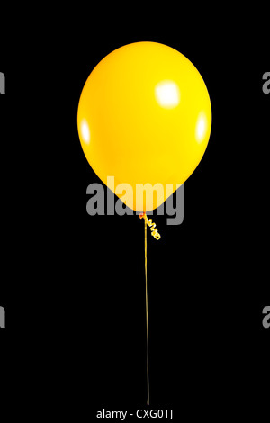 Single yellow balloon isolated on white. Clipping path included Stock ...