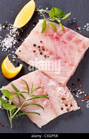 Raw ocean red perch fillet, Snapper fish with herbs. Isolated, white ...