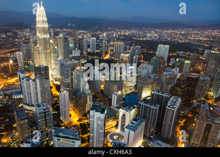 Aerial view Petronas Twin Towers shot at night in the capital of ...