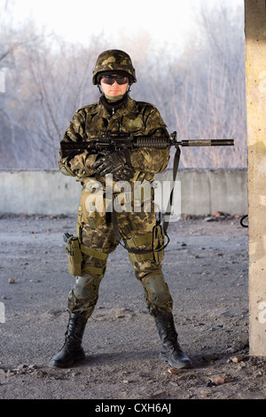 Commando with Helmet holding M16 gun Stock Photo - Alamy