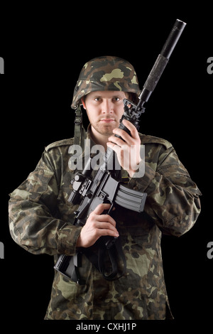 man in black uniform with M16 rifle isolated on white Stock Photo - Alamy