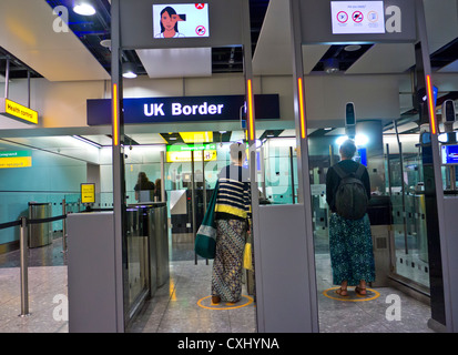 Immigration and passport control, Terminal 2, Heathrow Airport Stock ...