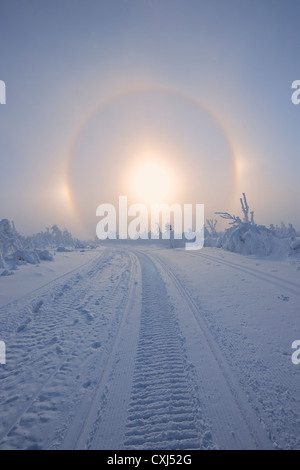 Germany, Saxony, View of sundog with snowy landscape Stock Photo - Alamy