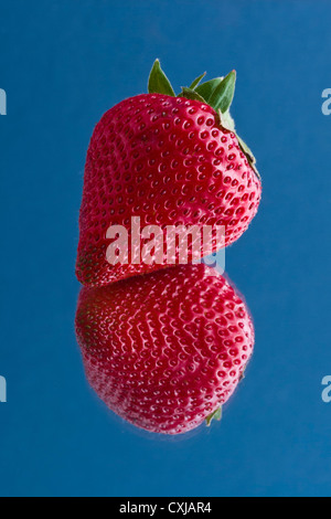 Strawberries & reflections in a mirror Stock Photo - Alamy
