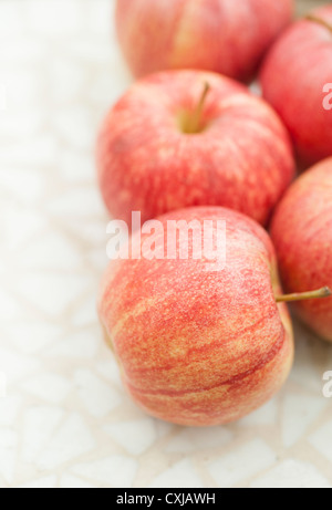 Closeup of red juicy apple on wooden background Stock Photo - Alamy