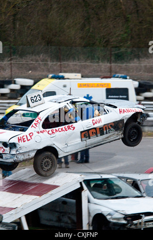 Car Jumping Over Other Cars at a Banger Race Stock Photo - Alamy