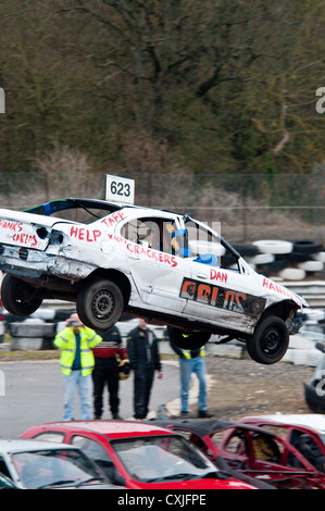 Car Jumping Over Other Cars at a Banger Race Stock Photo - Alamy