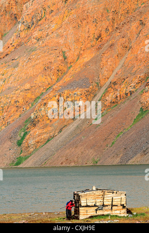 Hunting cabin near the shore of Etah, an old Inuit village site in Kane ...