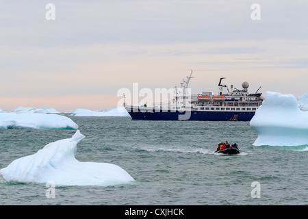 Adventure Canada cruise ship Clipper Adventurer anchored off Pim Island ...