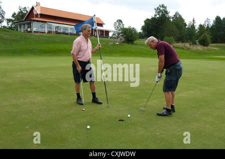 A man playing golf, Sweden Stock Photo - Alamy