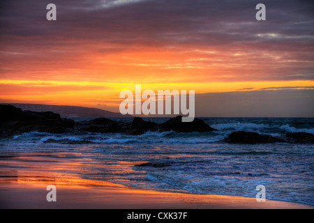 Sunset over the beach at Hayle in Cornwall from the sand dunes at ...
