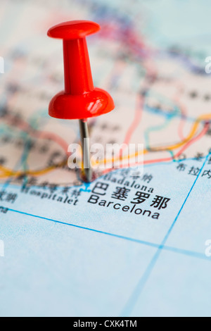 Thumbtack stuck in the map Stock Photo - Alamy